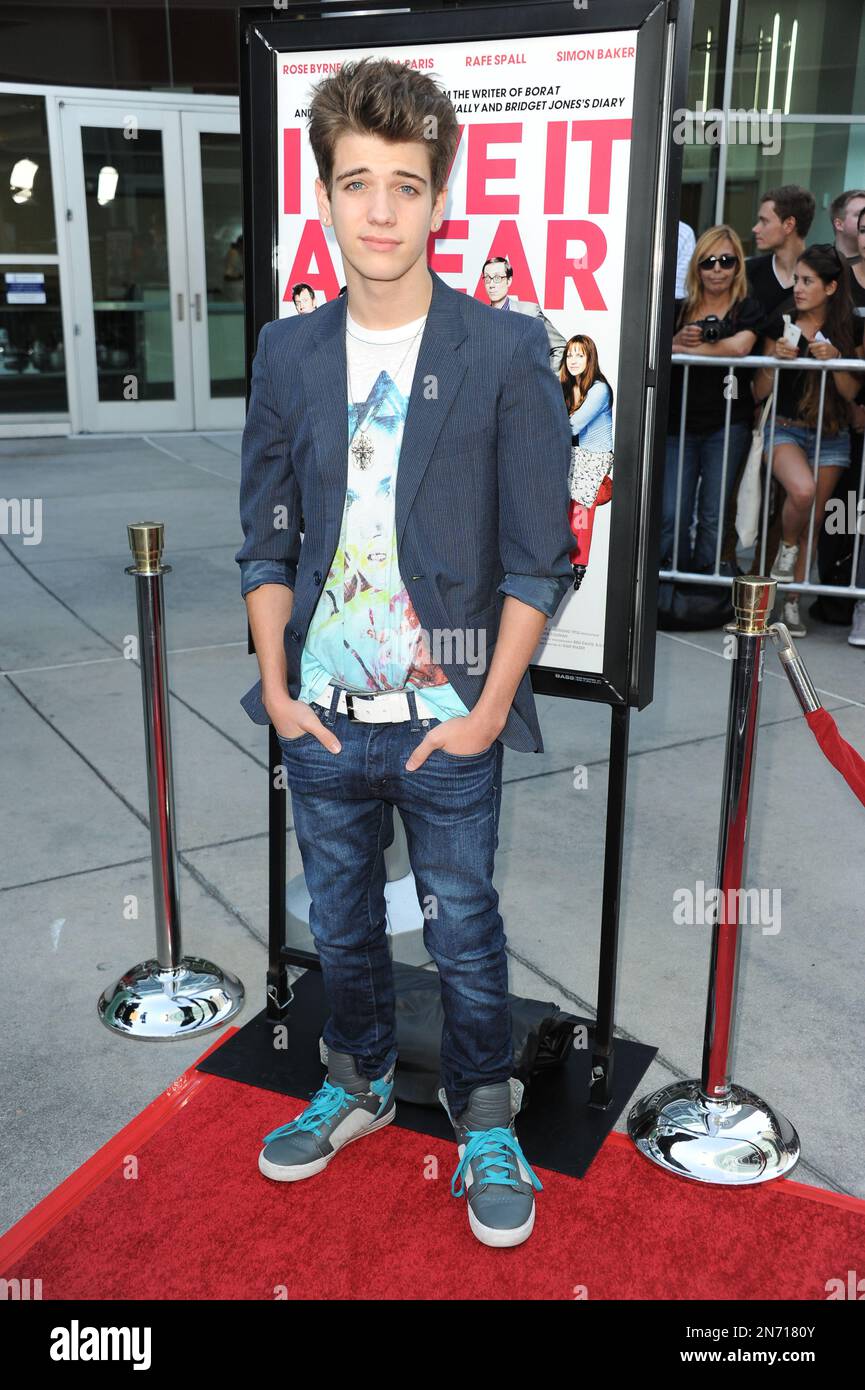 Brandon Tyler Russell arrives at a special screening for "I Give It A ...