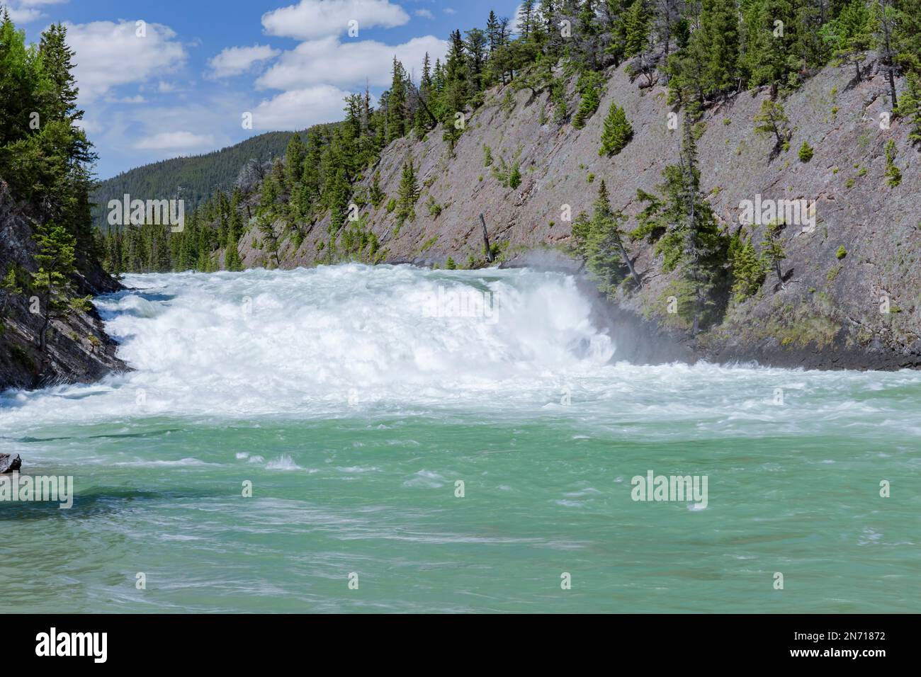 Glacial silt colours the water downstream from Bow Falls at Banff ...