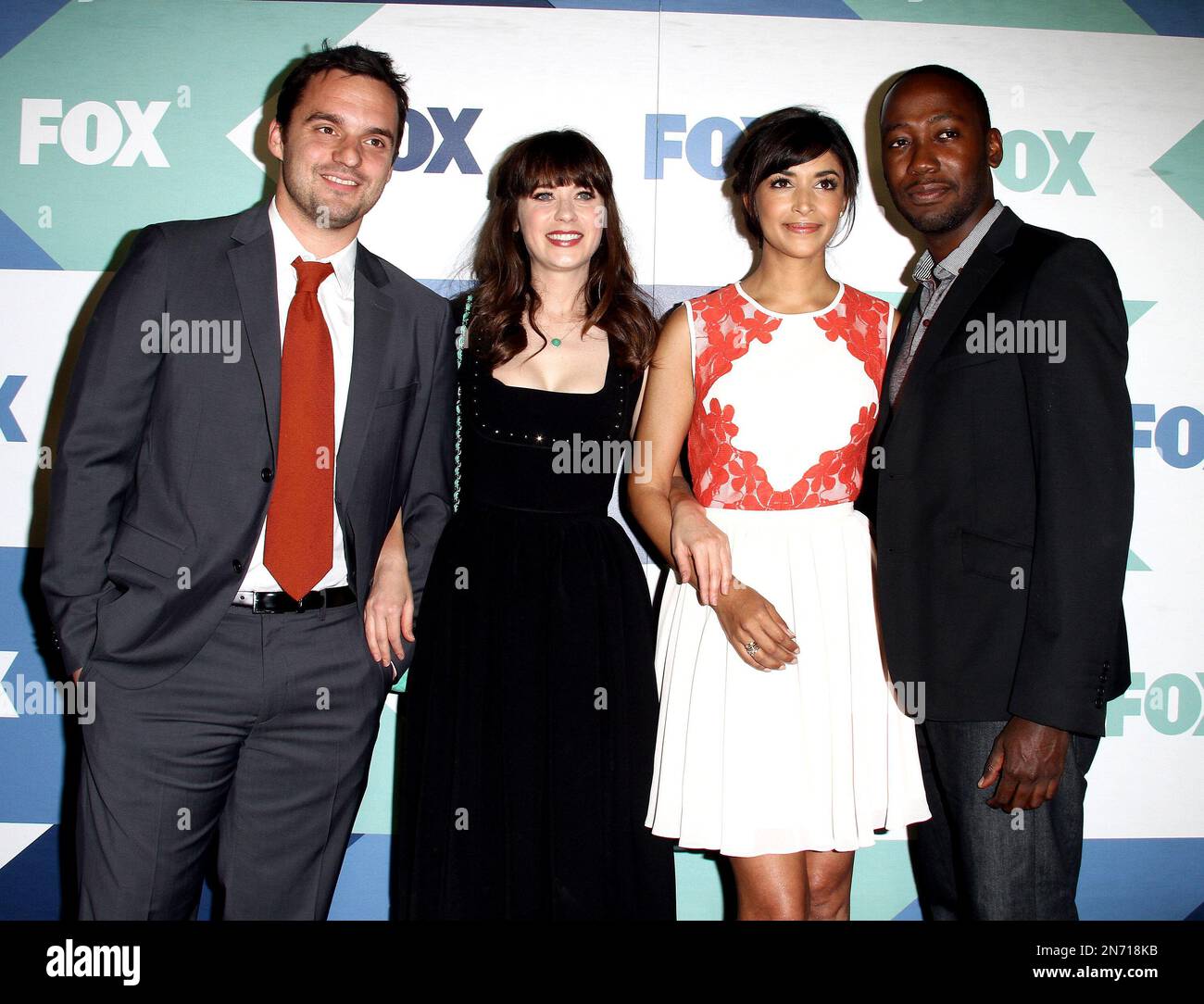 From left, actors Jake Johnson, Zooey Deschanel, Hannah Simone and Lamorne Morris arrive at the ...