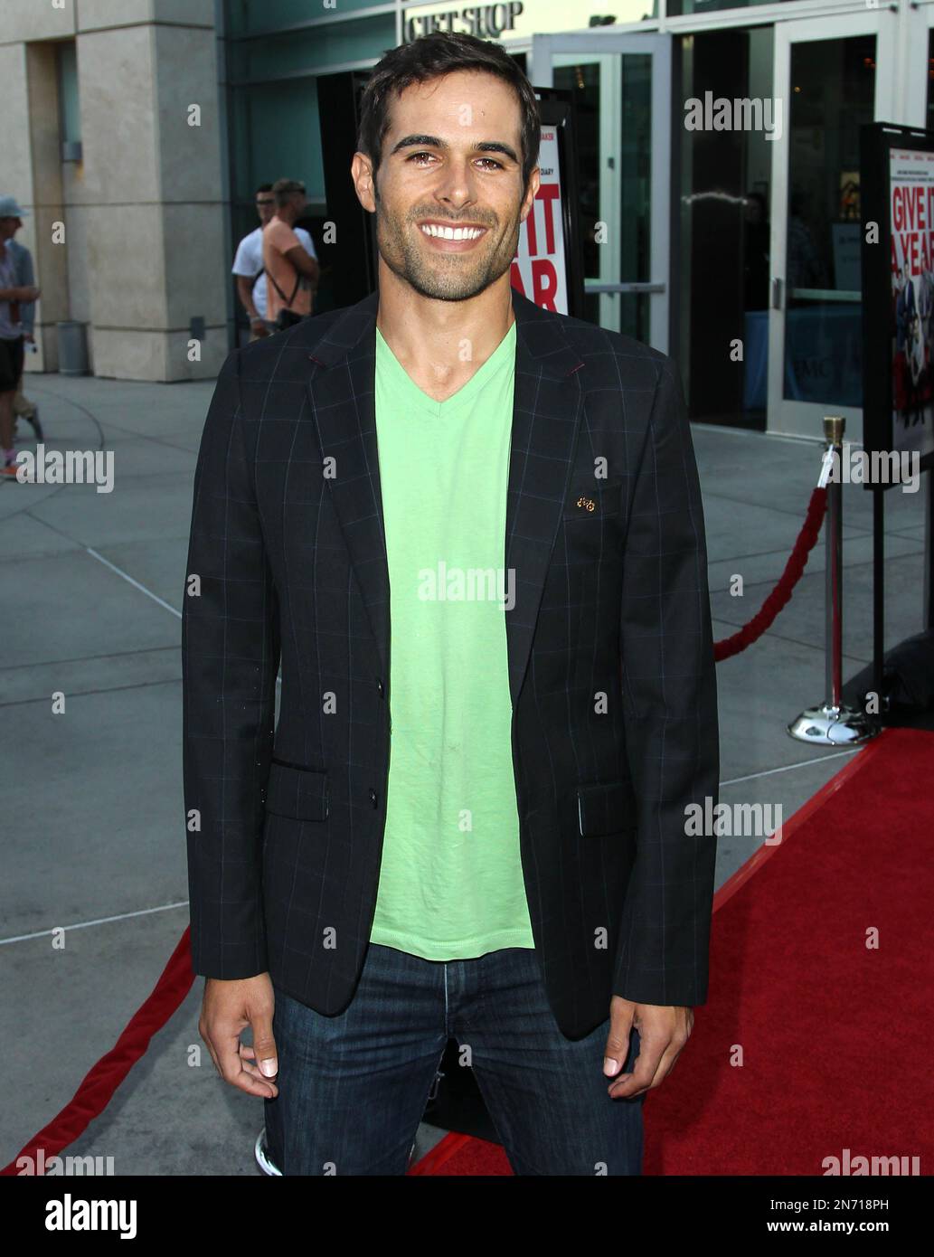 Christopher Wolfe arrives on the red carpet at a special screening for "I Give It A Year" at the ...