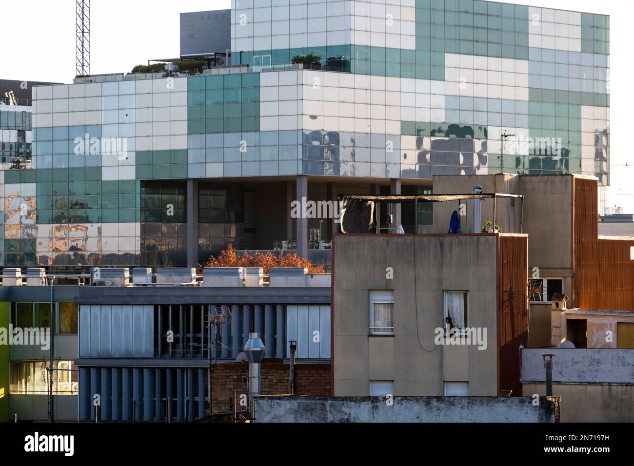 Architecture contrast of residential buildings and modern office towers ...