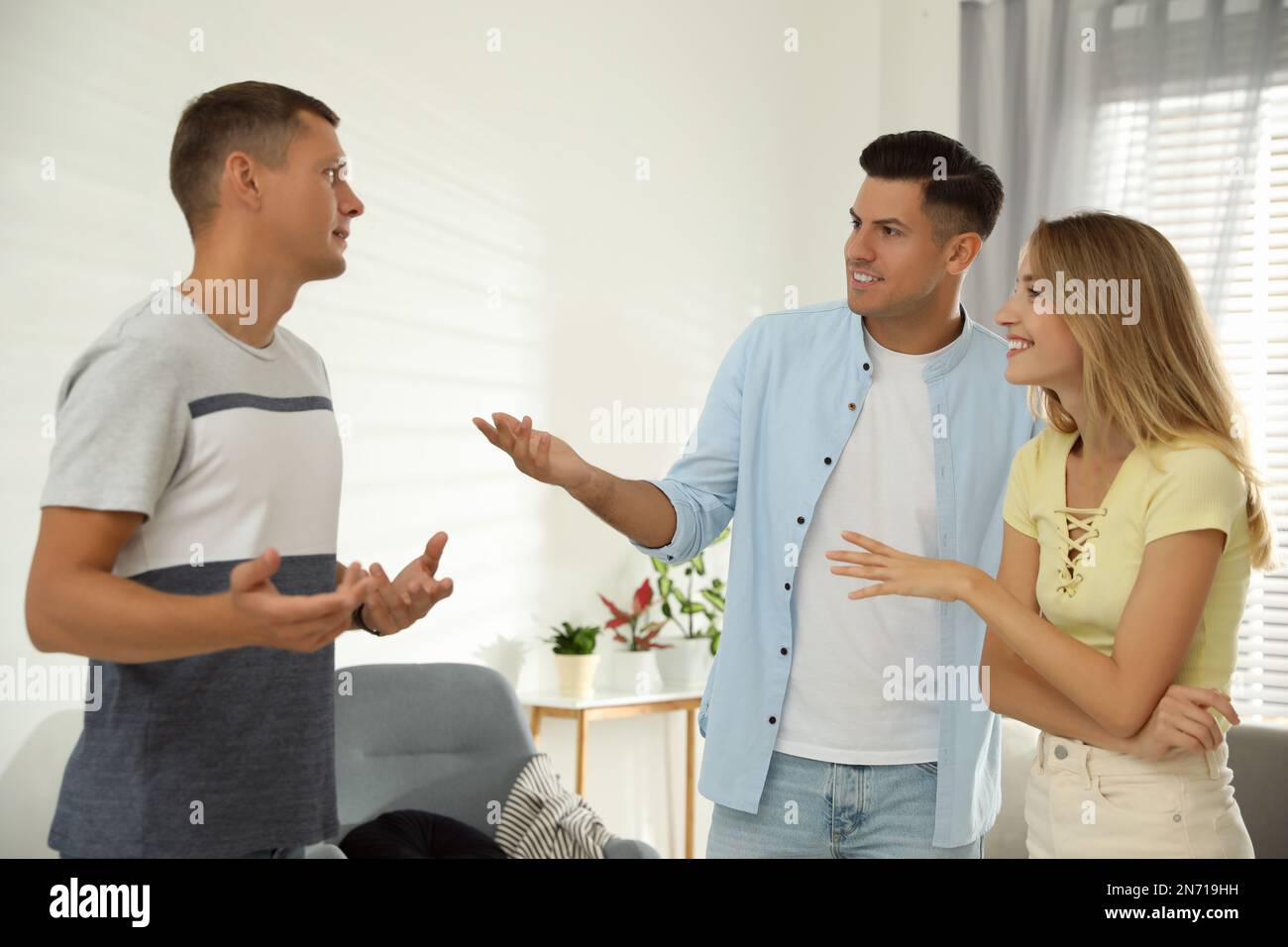 Group talking happy gesture hi-res stock photography and images - Alamy