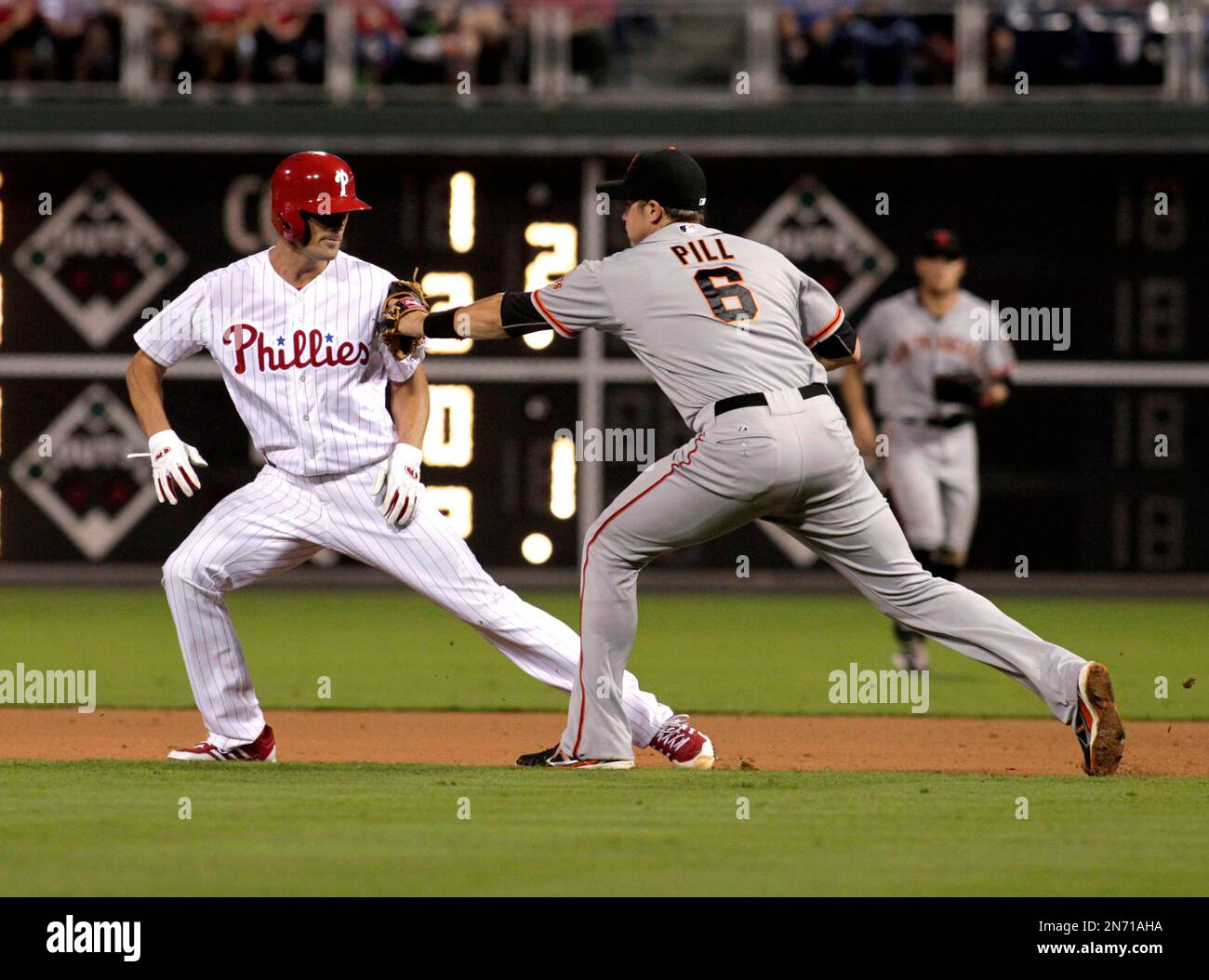 Philadelphia Phillies' Cole Hamels is tagged out in a rundown by San ...