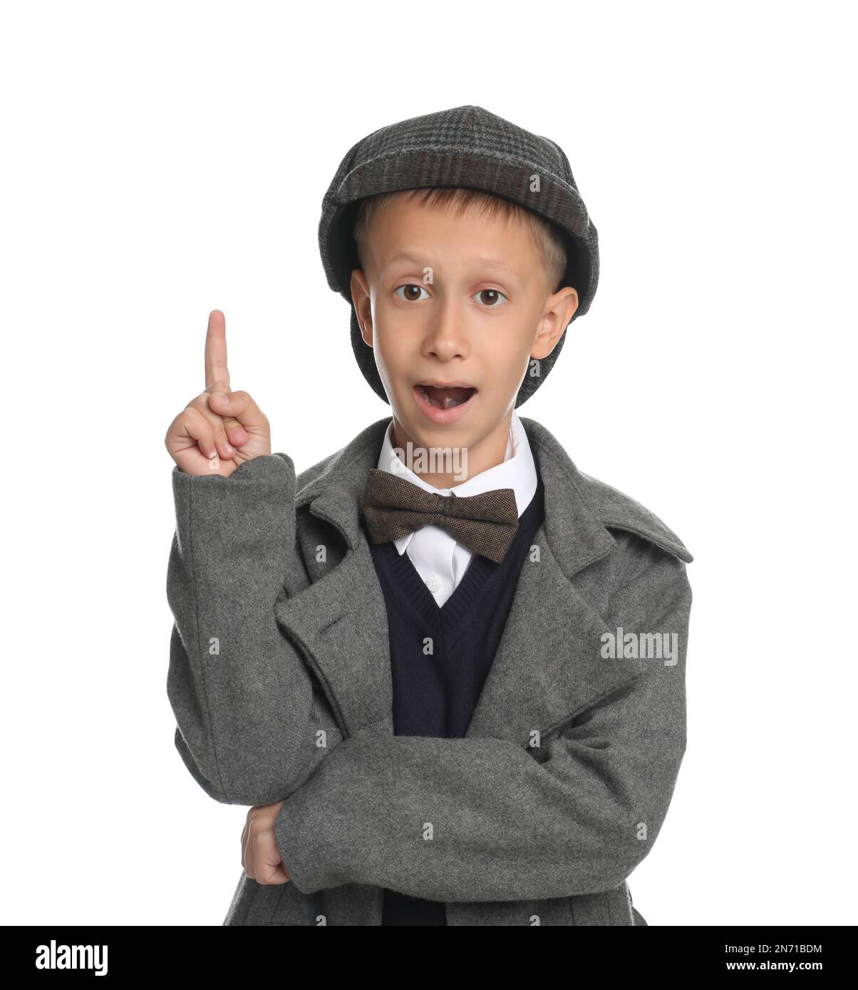 Cute little detective in hat and coat on white background Stock Photo ...