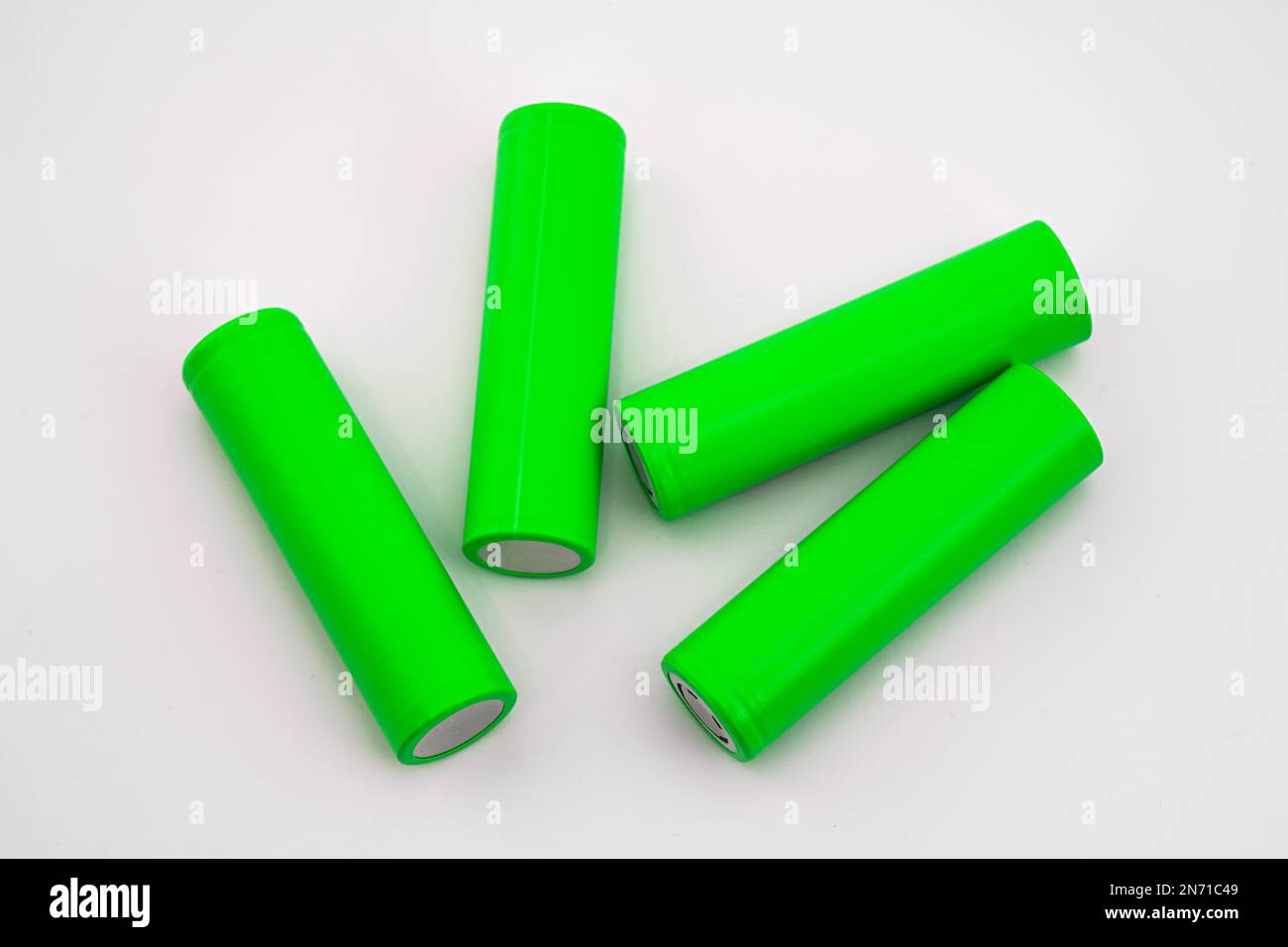 The green batteries isolated on white background Stock Photo - Alamy