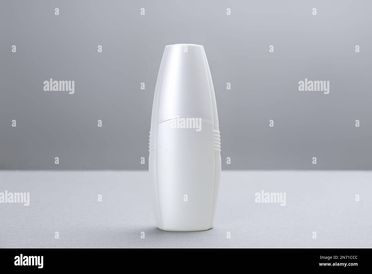 Bottle with insect repellent spray on grey background Stock Photo - Alamy