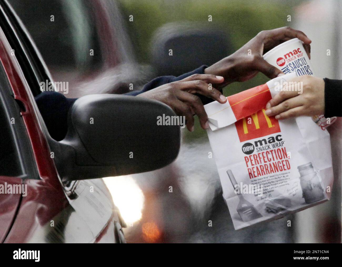 FILE - In this Jan. 22, 2010 file photo, a customer grabs lunch at a ...