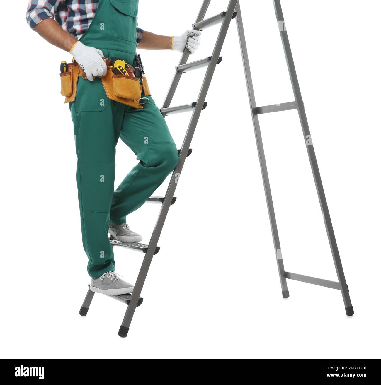 Professional builder climbing up metal ladder on white background ...
