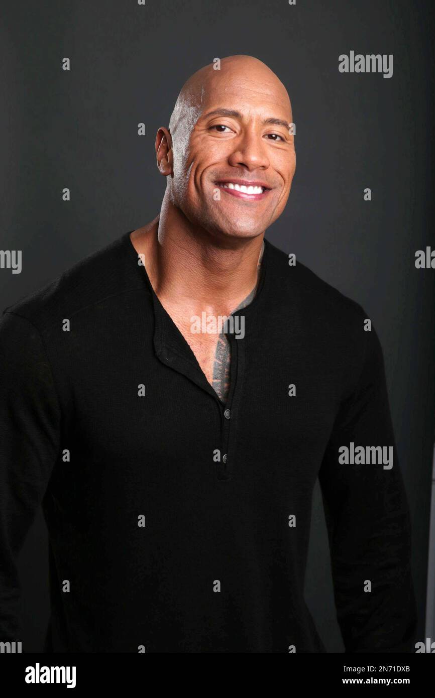 FILE - This March 23, 2013 file photo shows actor Dwayne Johnson posing ...