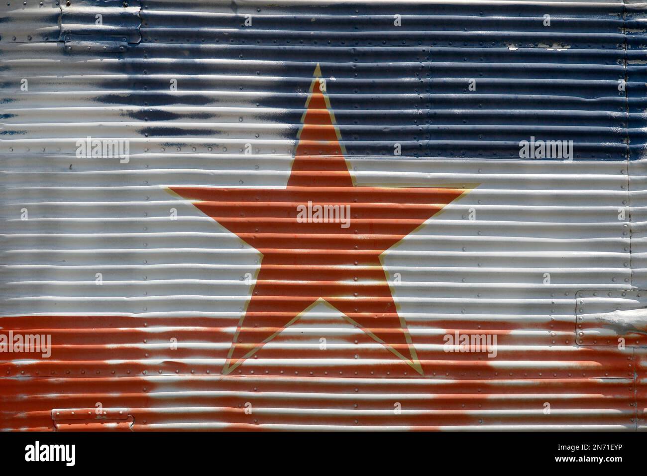 In this Wednesday, July 31, 2012, photo, an old Yugoslav flag with the ...