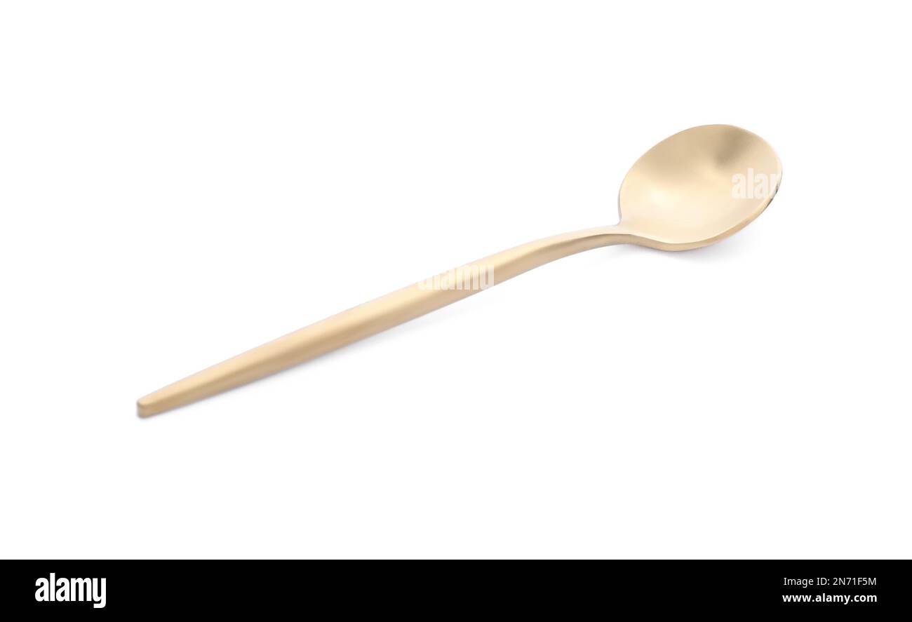 Shiny golden tea spoon isolated on white Stock Photo - Alamy