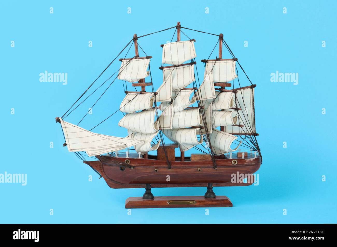 Beautiful ship model on light blue background Stock Photo - Alamy
