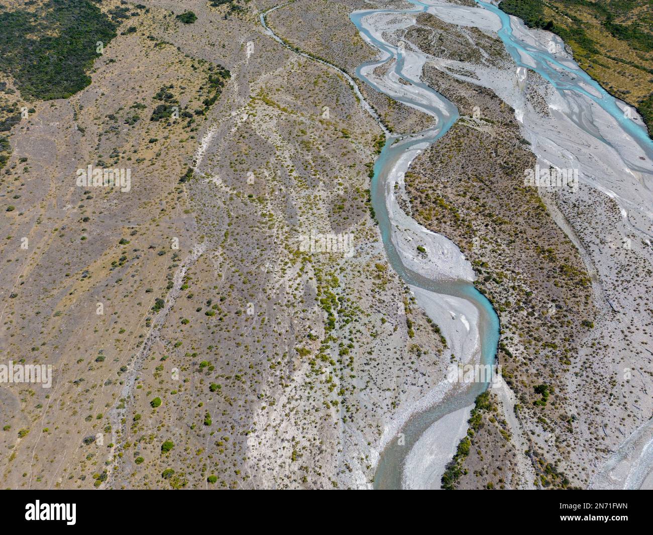 Aerial View of a creek flowing to the beautiful Lago General Carrera in ...