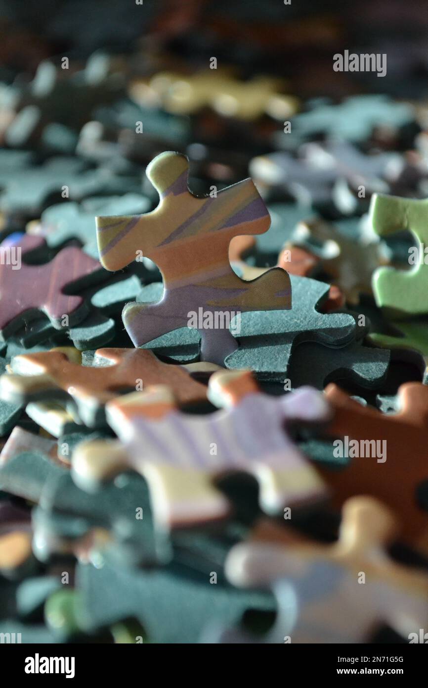 Jigsaw Puzzle Pieces In A Pile All Together - Piece Of Puzzle Standing ...