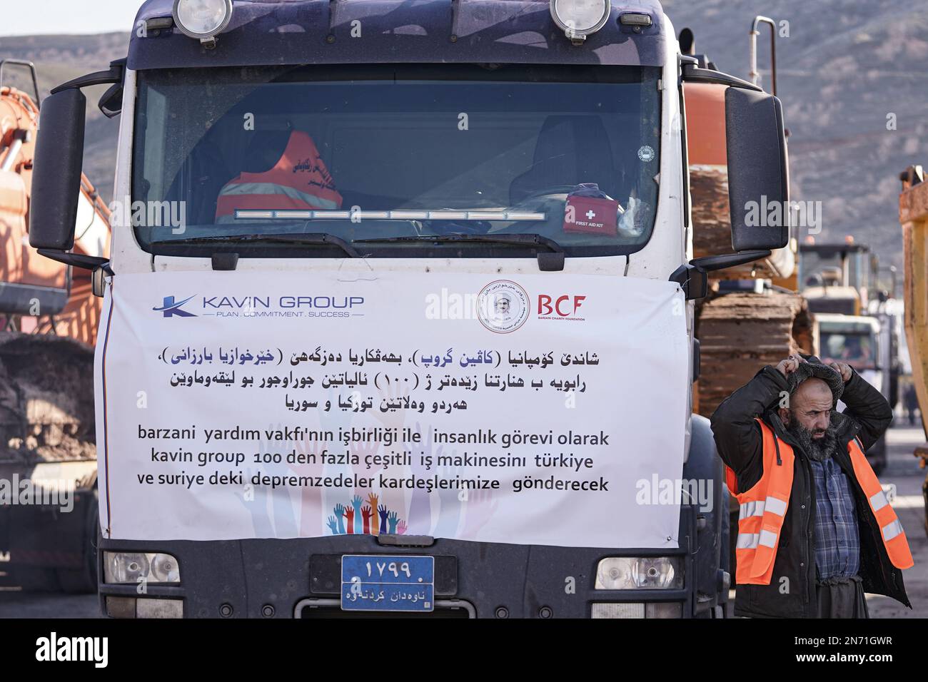 Dihok, Iraq. 10th Feb, 2023. Heavy vehicles and machinery pass through ...