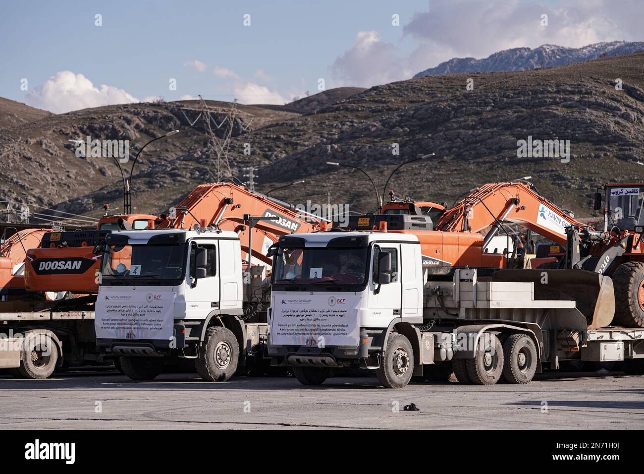 Dihok, Iraq. 10th Feb, 2023. Heavy vehicles and machinery pass through ...
