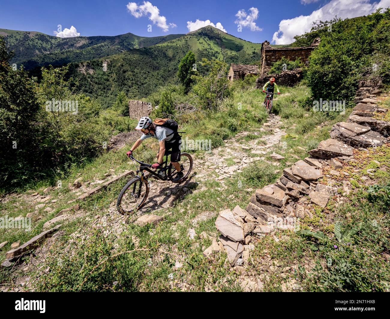 Single trail descent from Pelopín mountain (2, 007m). Ruins of the ...