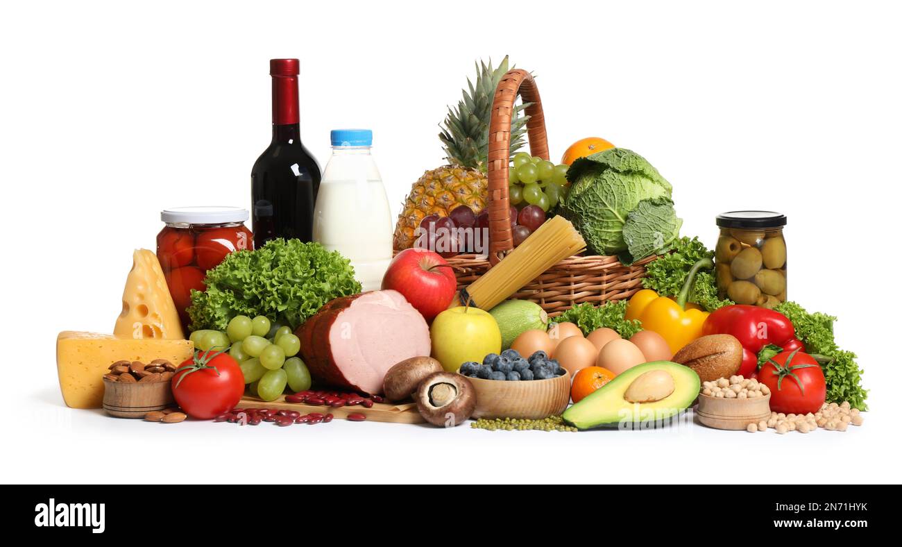 Different food products on white background. Balanced diet Stock Photo ...