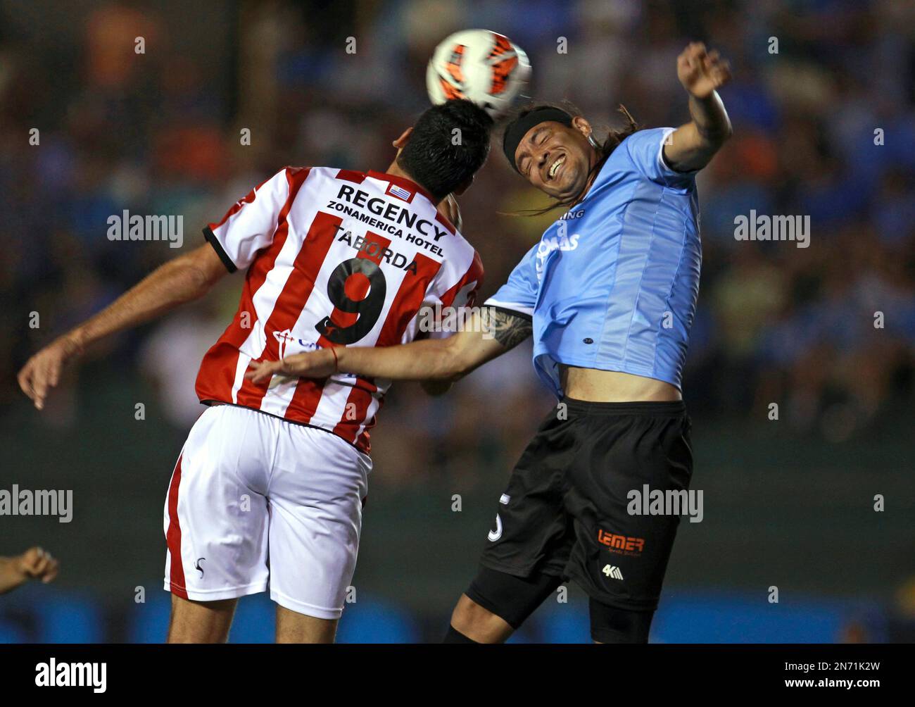 Bolivia's Blooming's Julio Moreira, right, and Uruguay's River Plate's ...