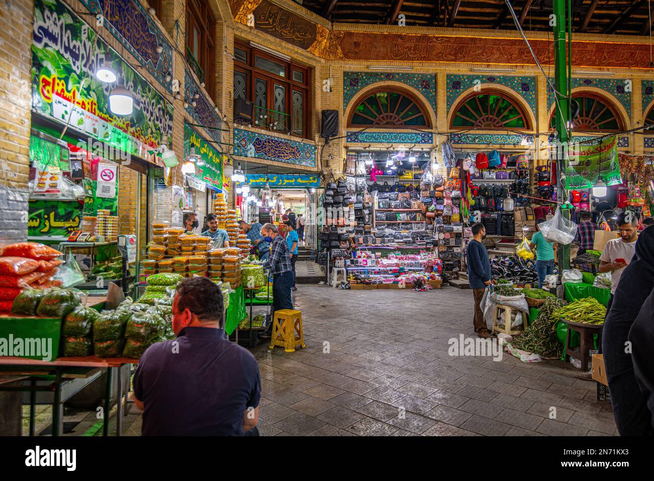 Crowds of locals and tourists buying variety of vegetables in Tajrish ...