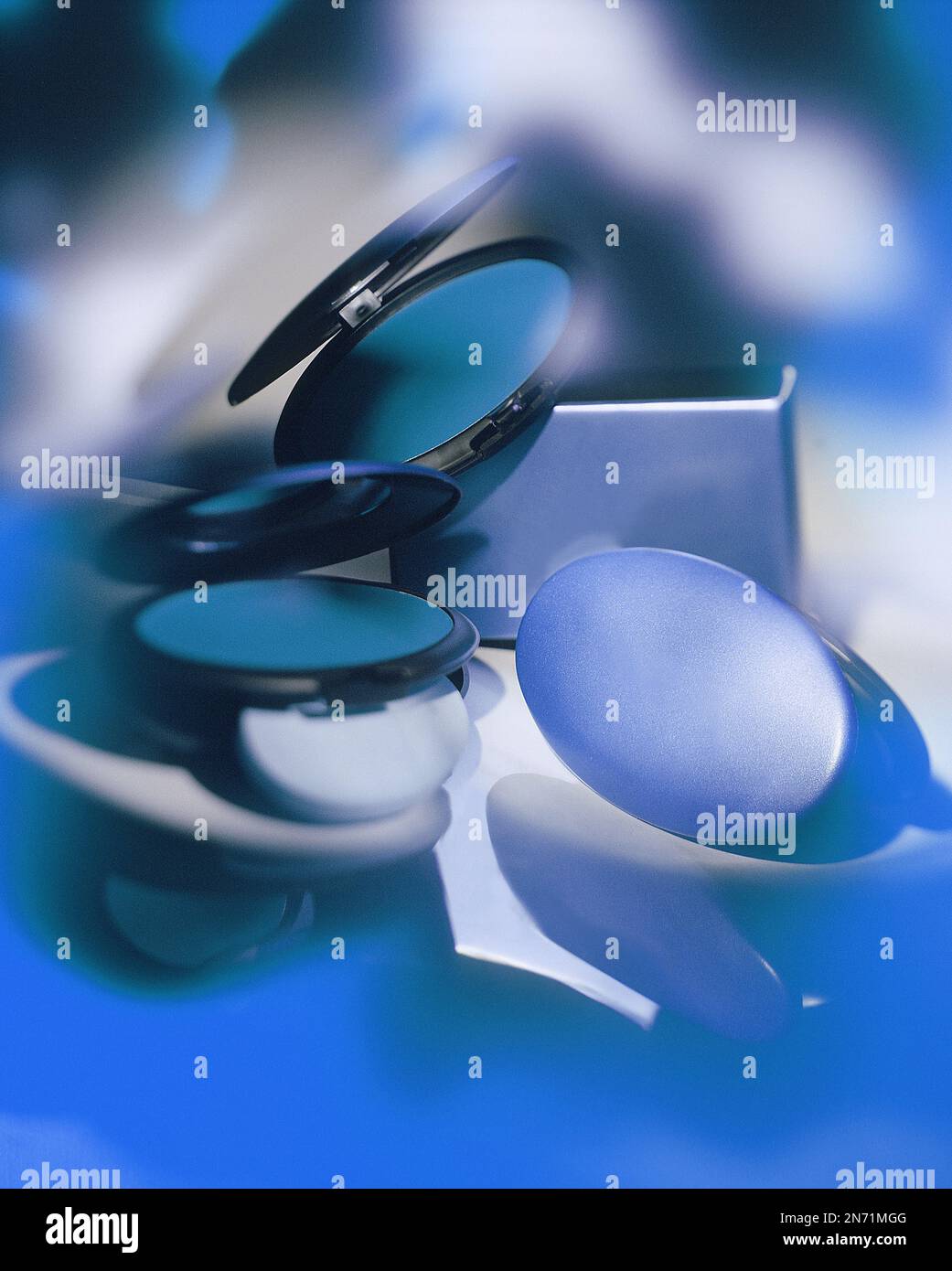 Group of private label oval cosmetic compact cases, Concept studio ...