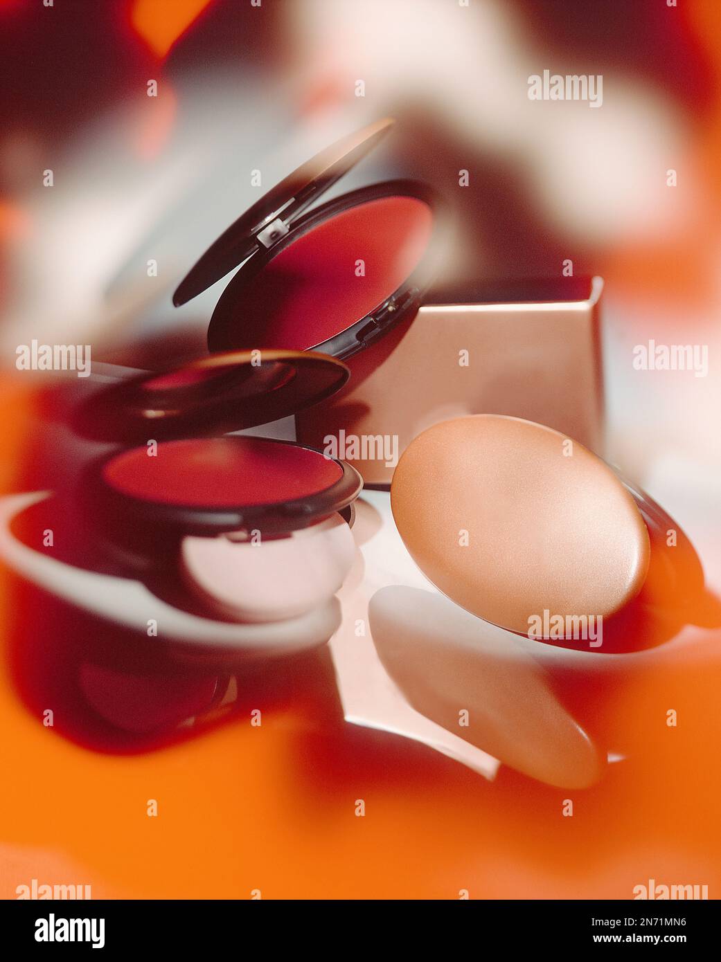 Group of private label oval cosmetic compact cases, Concept studio ...