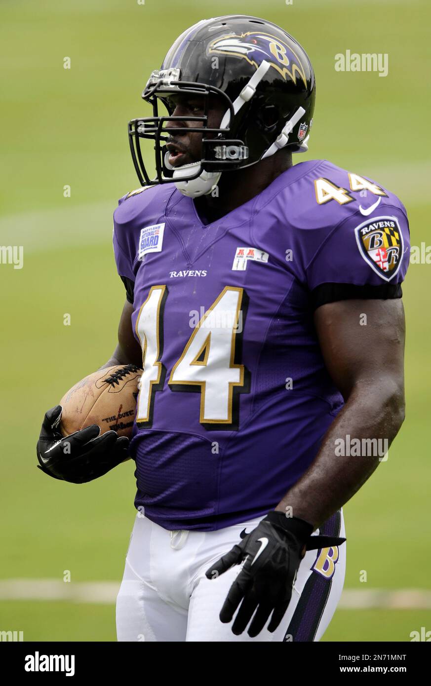 Baltimore Ravens fullback Vonta Leach walks on the field during NFL football training camp at ...