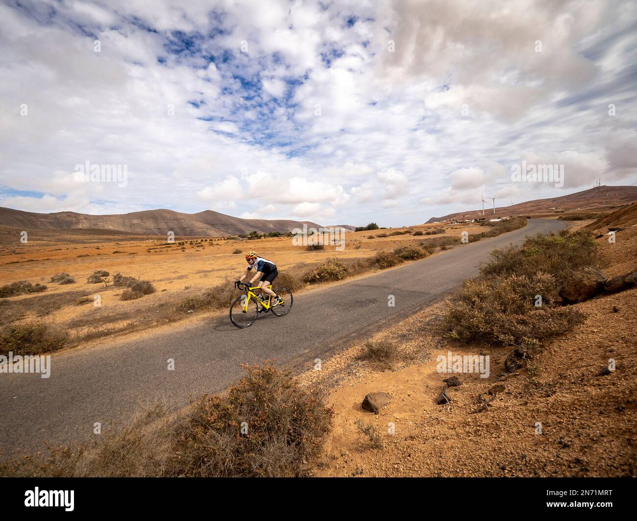 Road cyclist on lonely side road between La Matilla and El Time, Canary ...