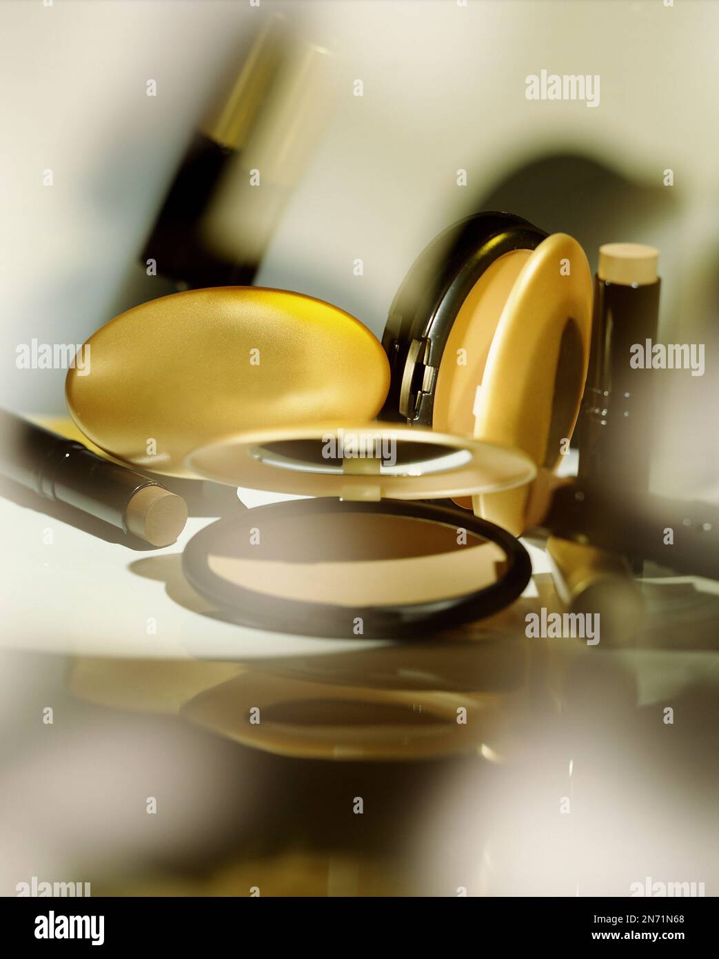 Group of private label oval cosmetic compact cases and foundation ...