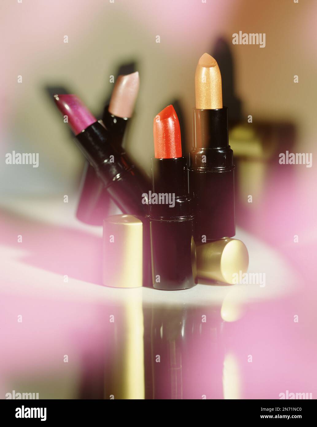 Group of private label lipsticks, open, bullet showing. Concept studio ...