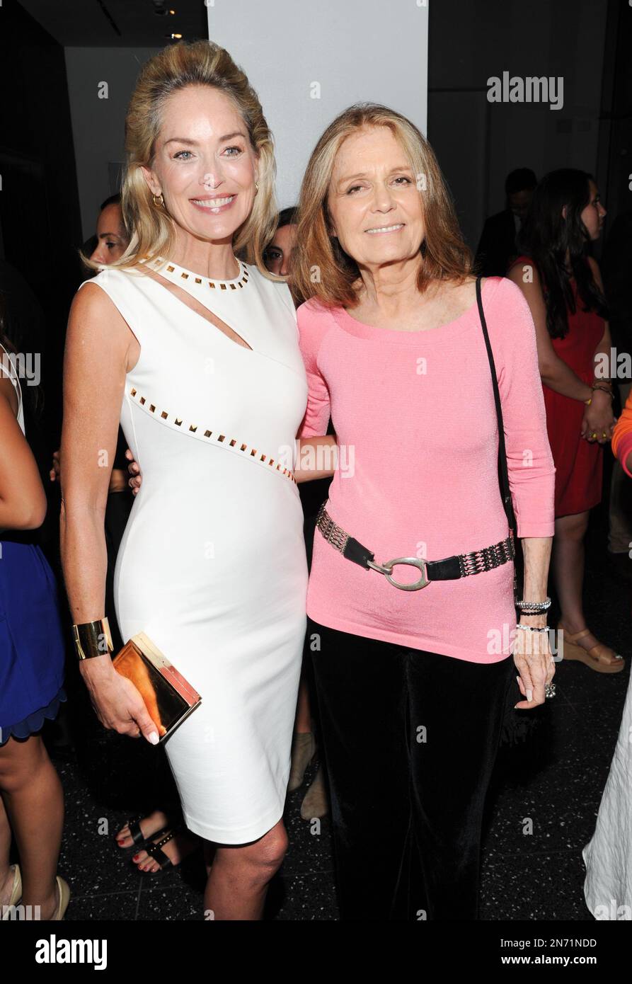 Actress Sharon Stone, left, and feminist Gloria Steinem pose together ...
