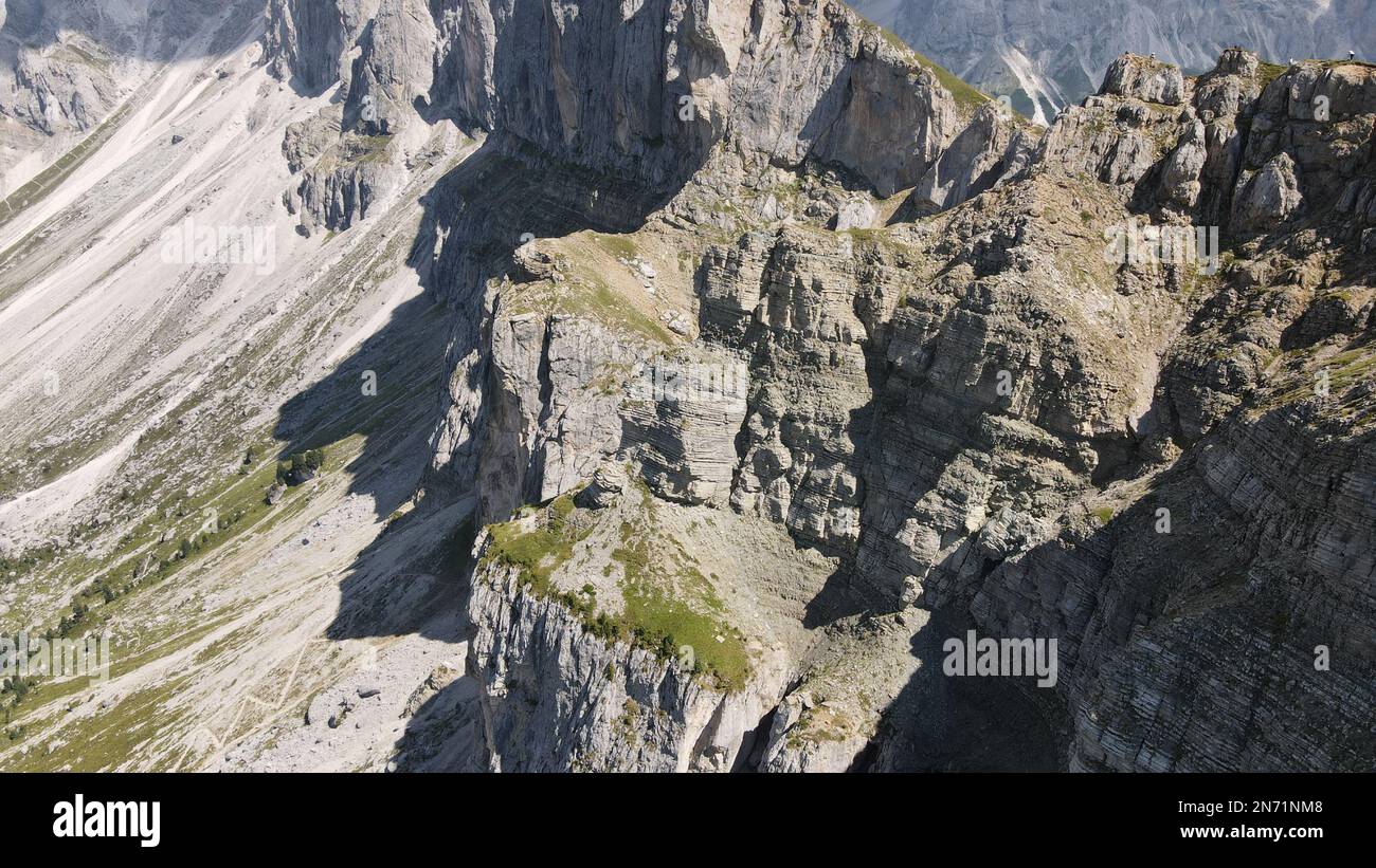 An aerial shot of Seceda Mountain on a sunny day in the Alps of Italy ...