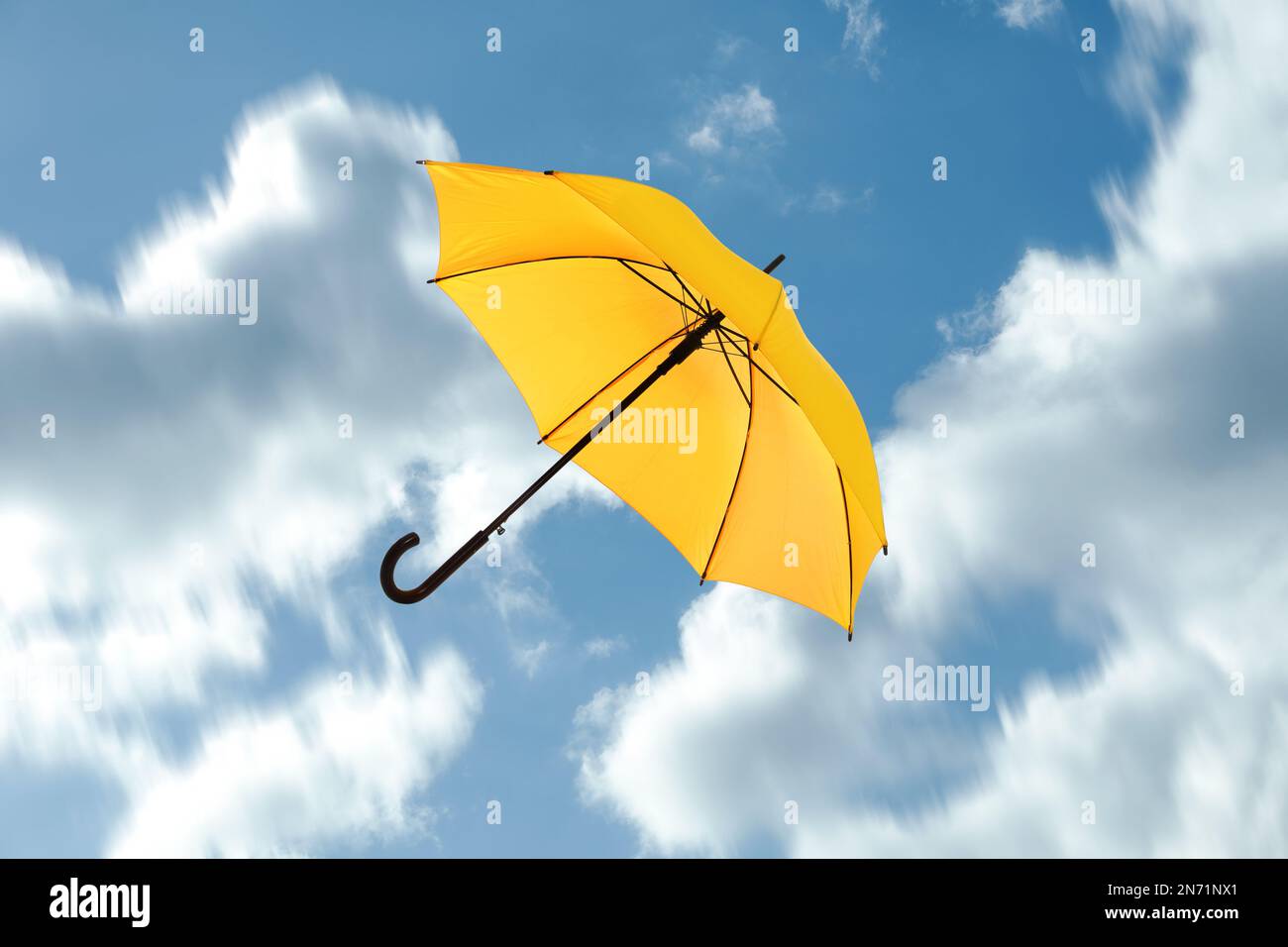 Wind blown umbrella hi-res stock photography and images - Alamy