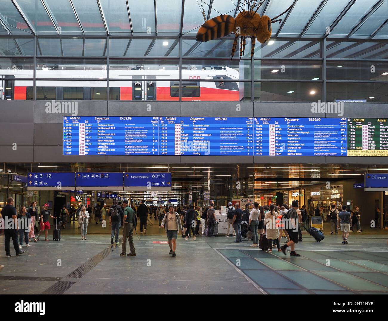 VIENNA, AUSTRIA - CIRCA SEPTEMBER 2022: People at Wien Hbf central ...