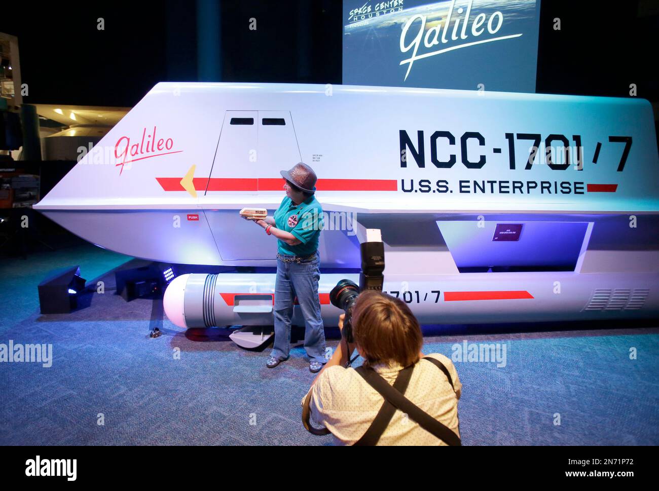 Candy Torres is photographed standing in front of the restored space ...