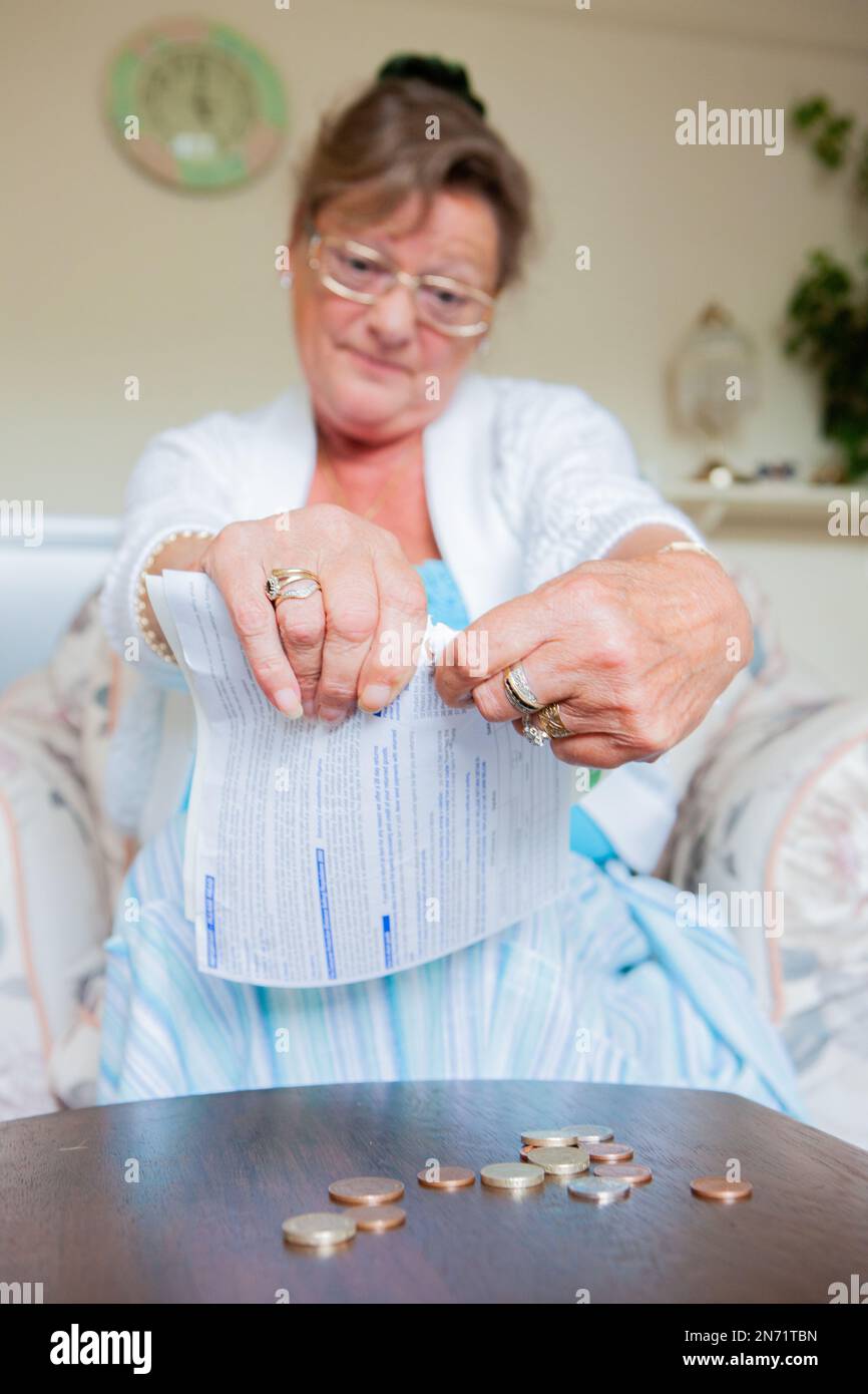 Ripping bills hi-res stock photography and images - Alamy