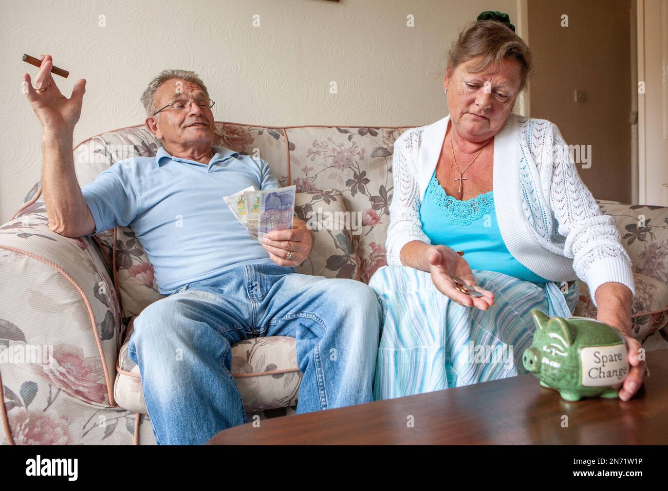Retirement: Rich and Poor. A senior couple in contrasting financial ...