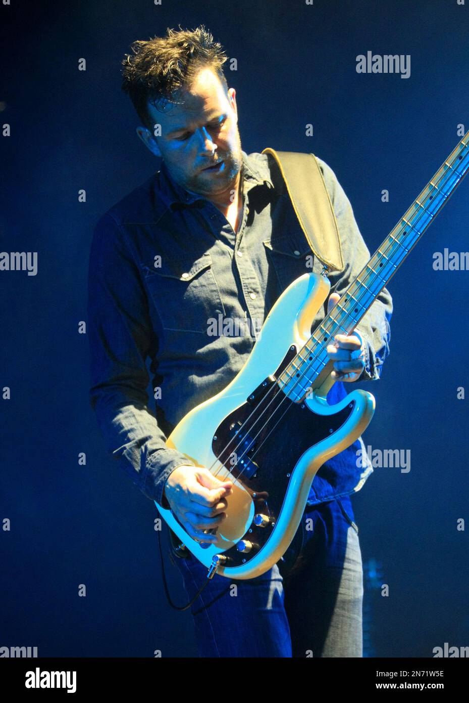 Tom Chapman of the alternative rock/electronic band New Order performs ...