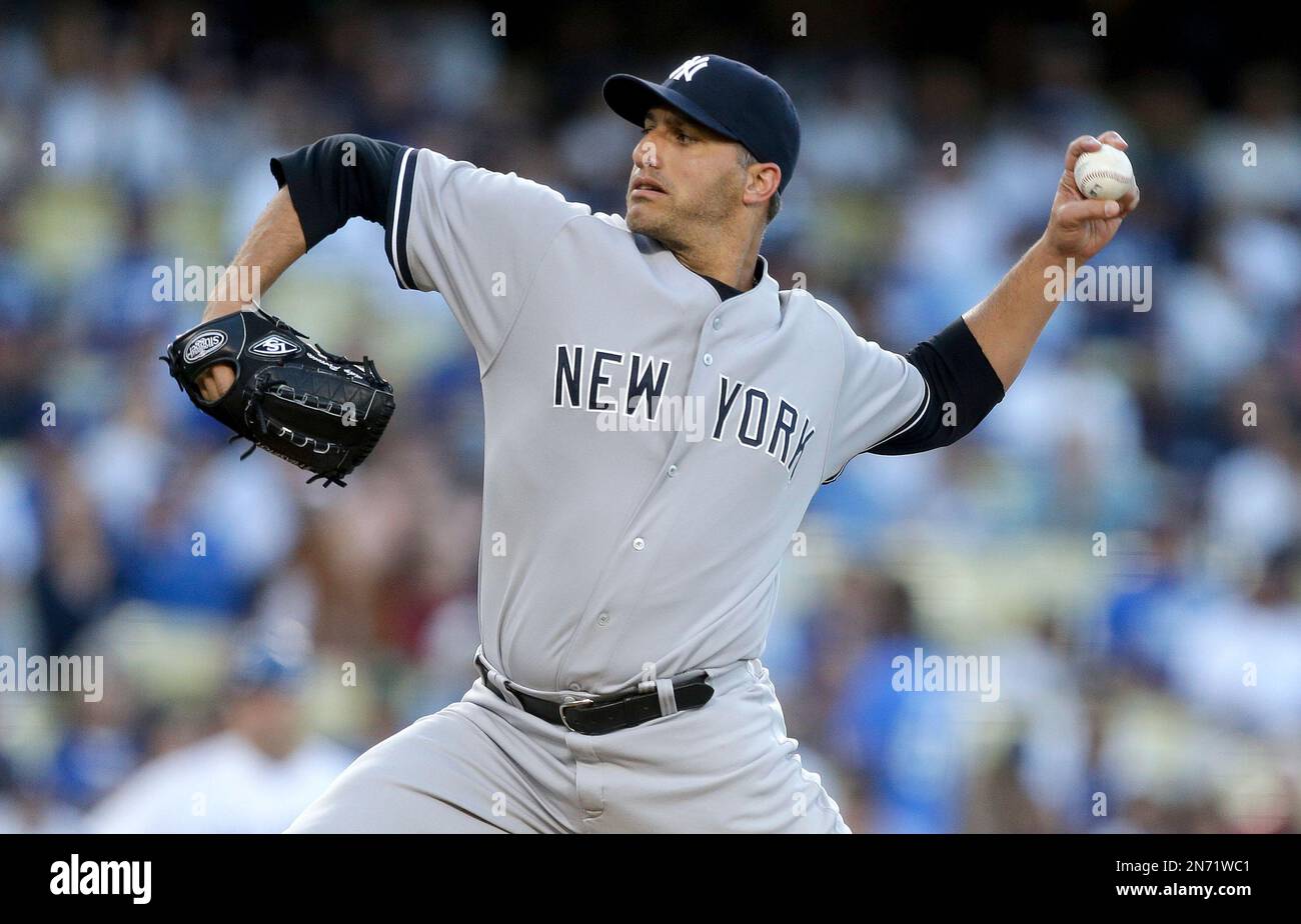 New York Yankees starting pitcher Andy Pettitte throws to the Los ...