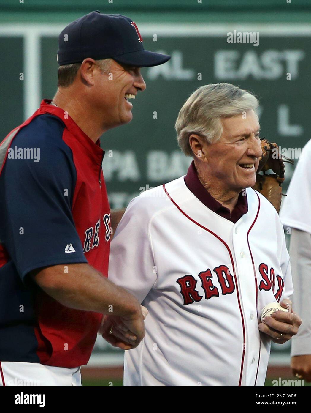 Former Boston Red Sox manager Joe Morgan, right, smiles with current ...