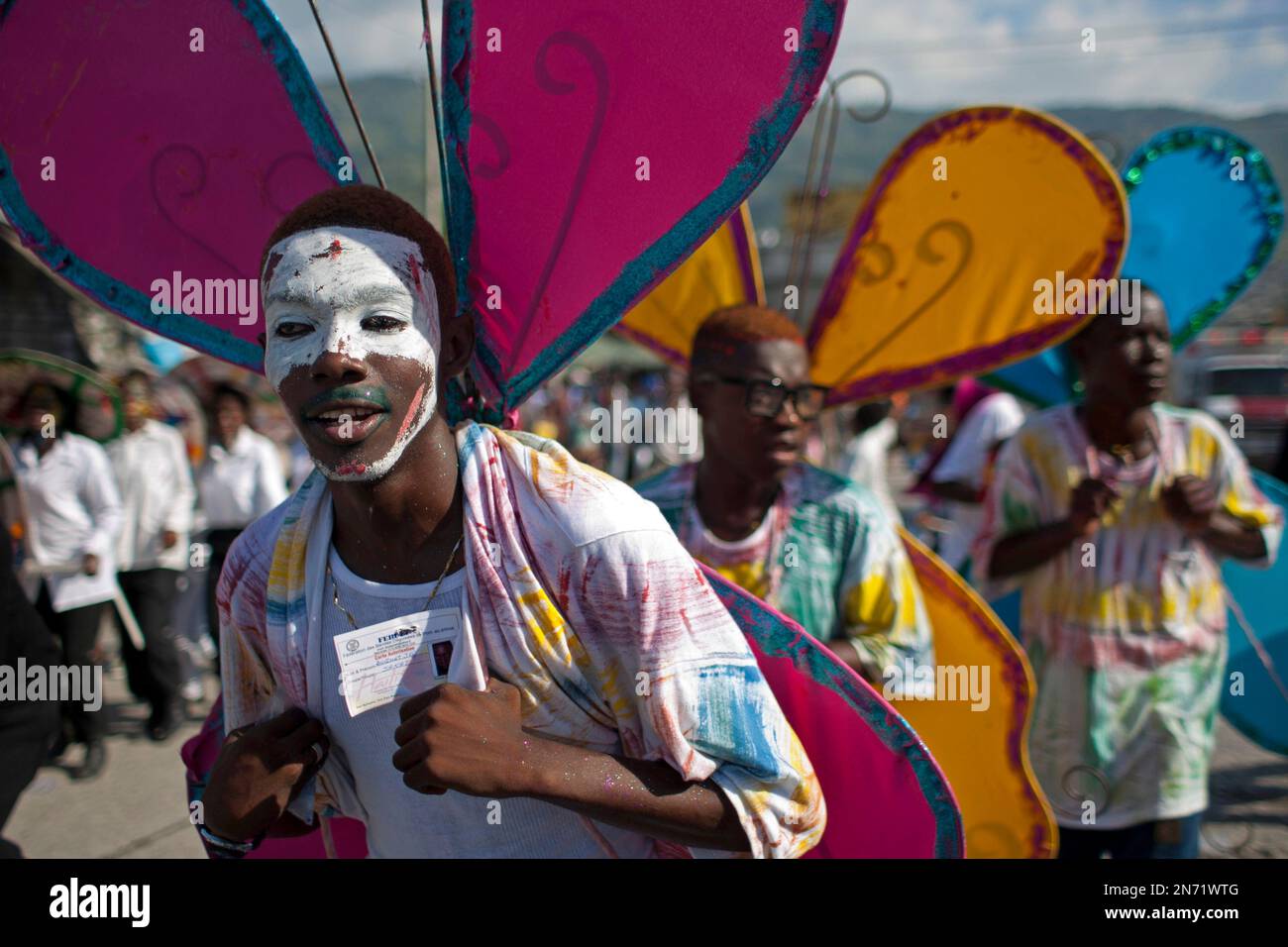 Revelers in costume parade during Carnaval des Fleurs, or Carnival of ...