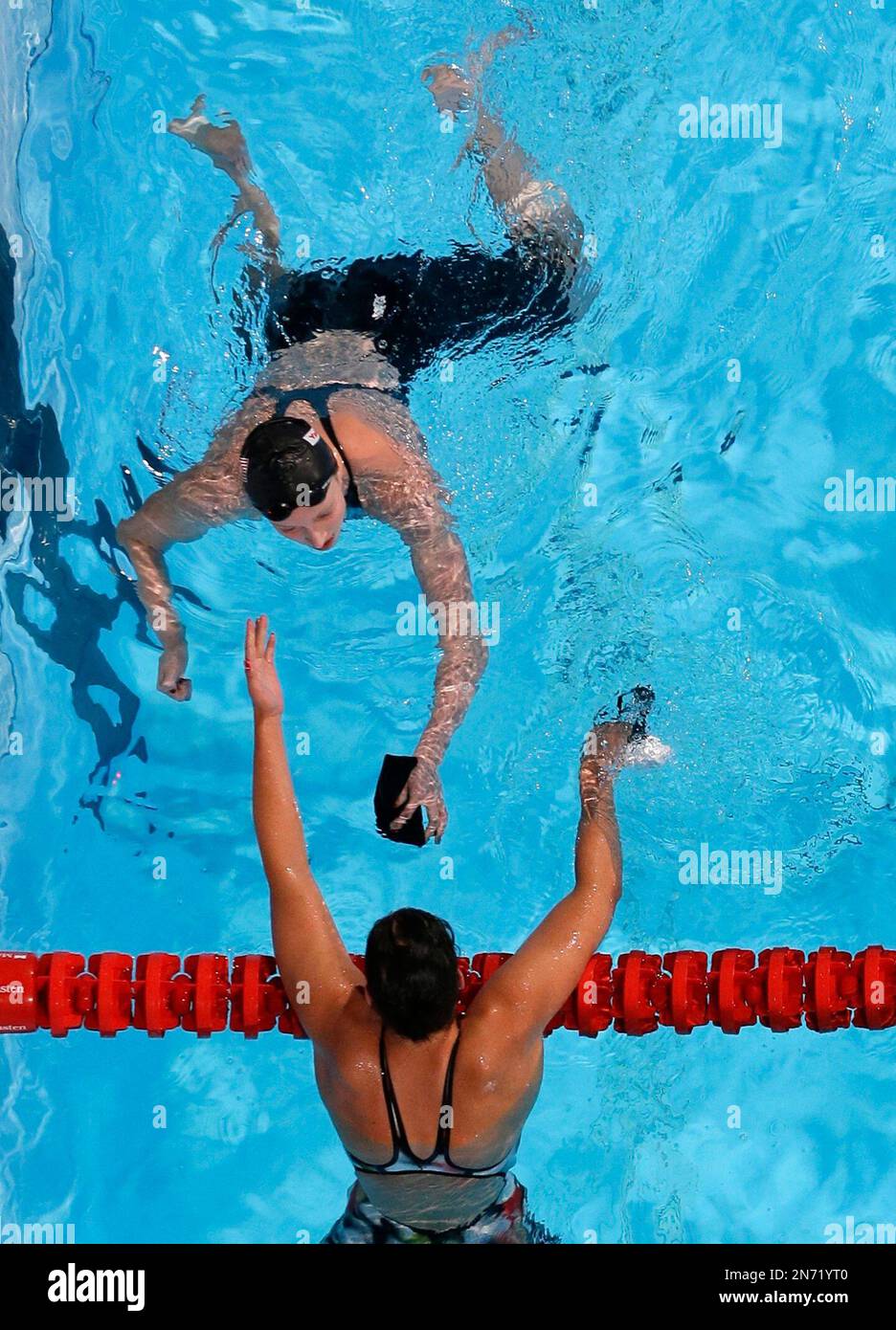 Denmark's Lotte Friis, bottom, and Katie Ledecky of the United States ...