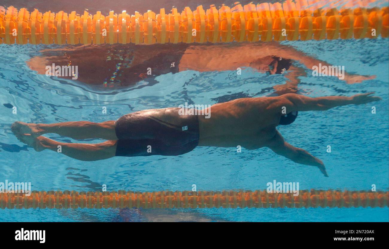 Matt Grevers of the United States swims to the gold medal in the Men's ...