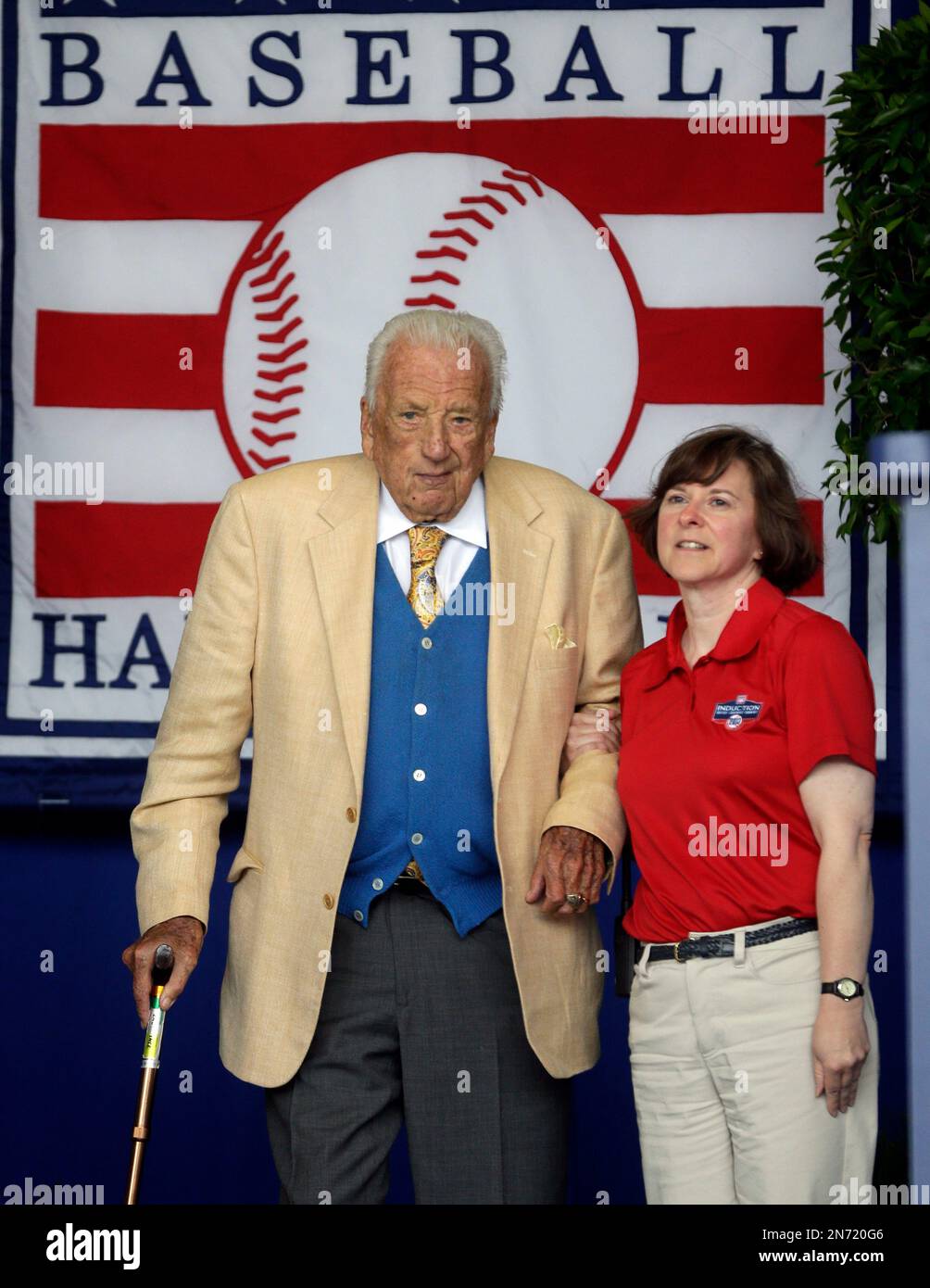Hall of Famer Ralph Kiner walks on stage during the Baseball Hall of ...