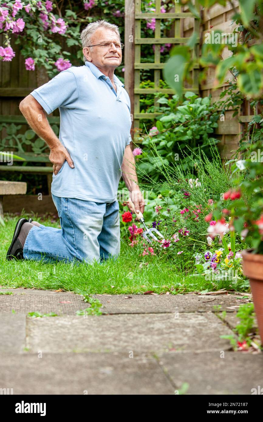 Back ache man hi-res stock photography and images - Alamy