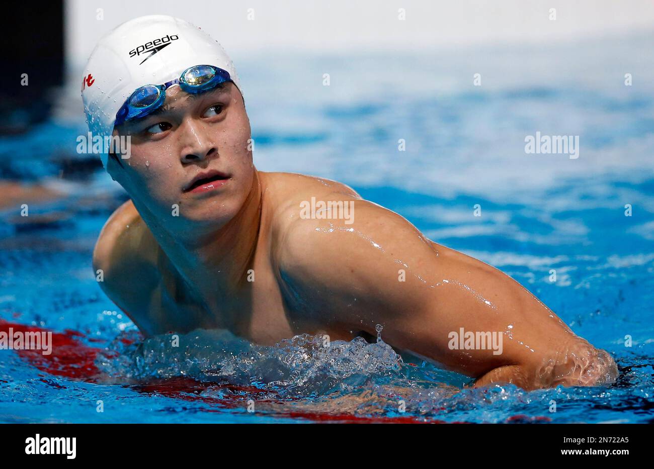 China's Sun Yang looks up after finishing a Men's 800m freestyle heat ...