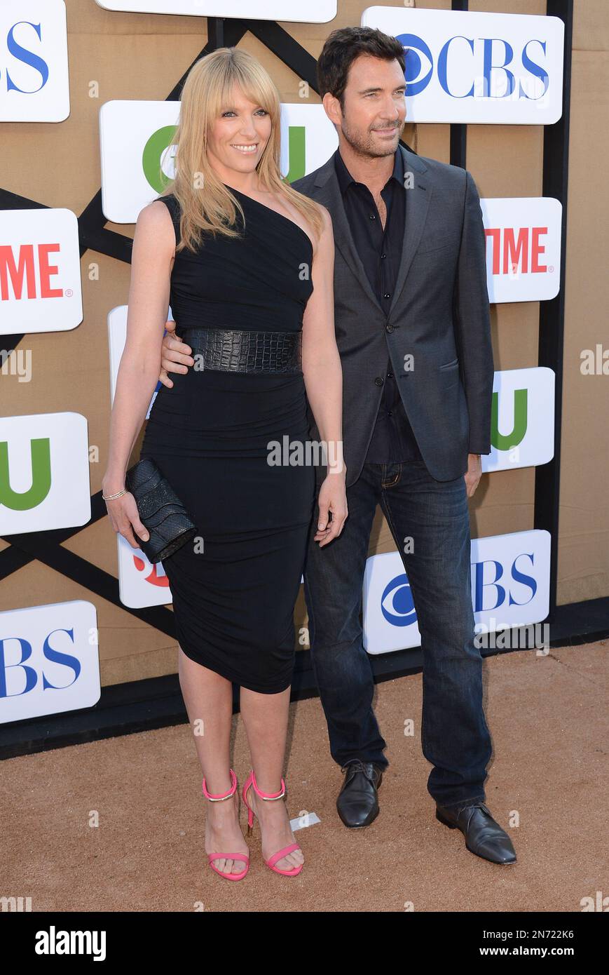 Toni Collette, left, and Dylan McDermott arrive at the CBS, CW and ...