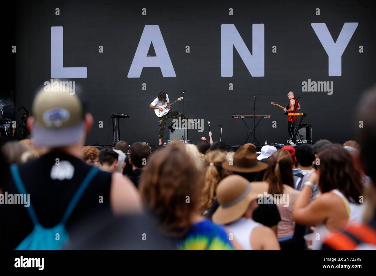 Paul Klein, (center) and Les Priest of the Band LANY perform during day ...