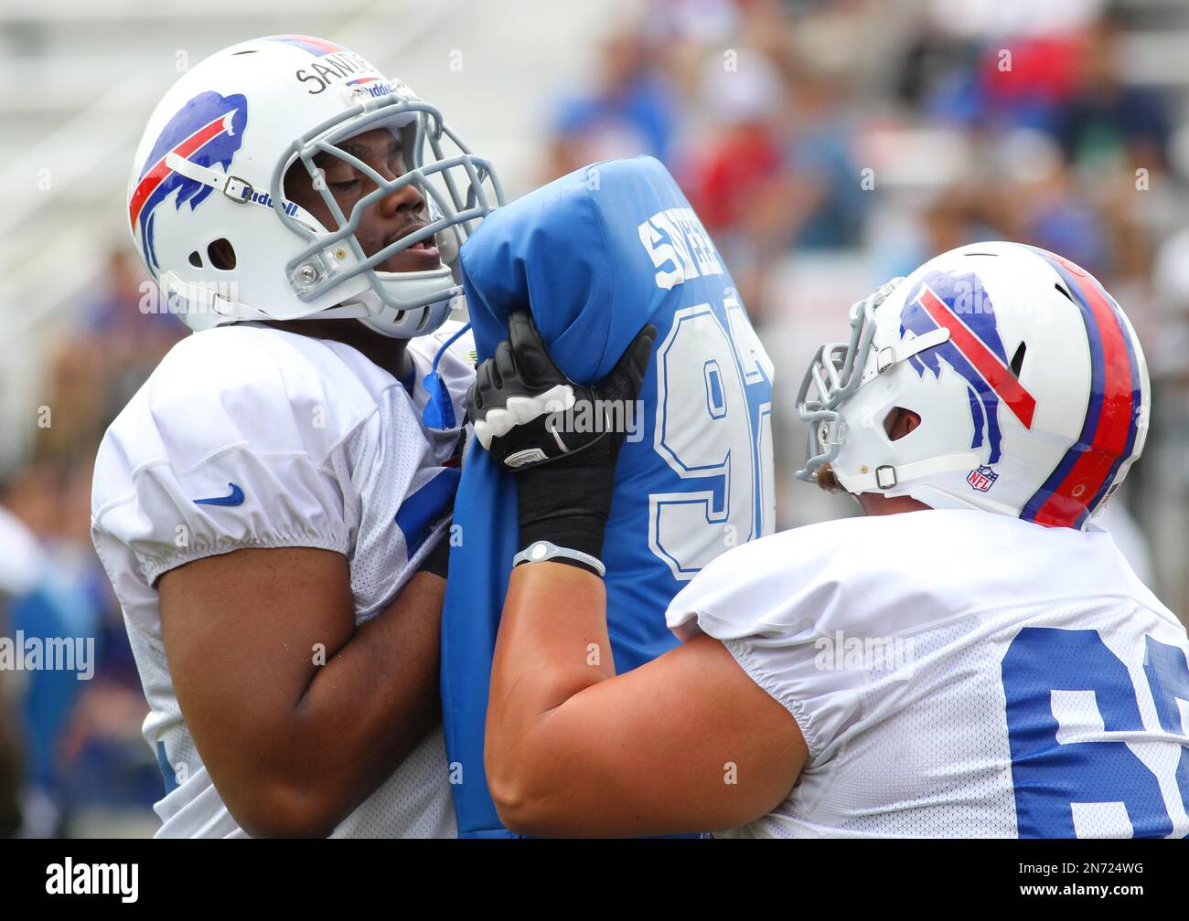 Buffalo Bills Zebrie Sanders, left, and Zack Chibane, right, do a ...