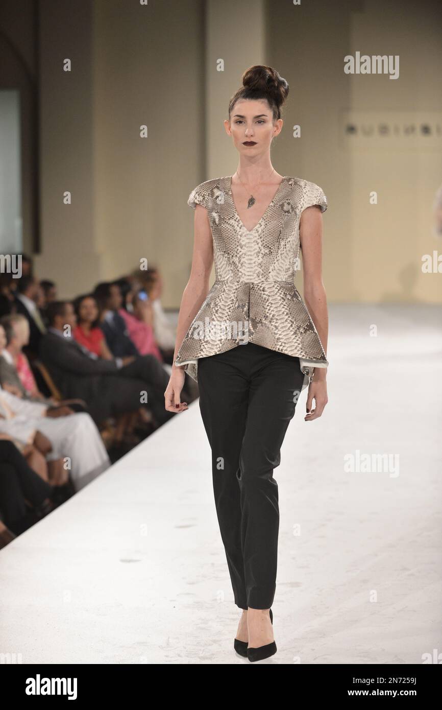 A model walks the runway wearing Rubin Singer during the15th Annual ...